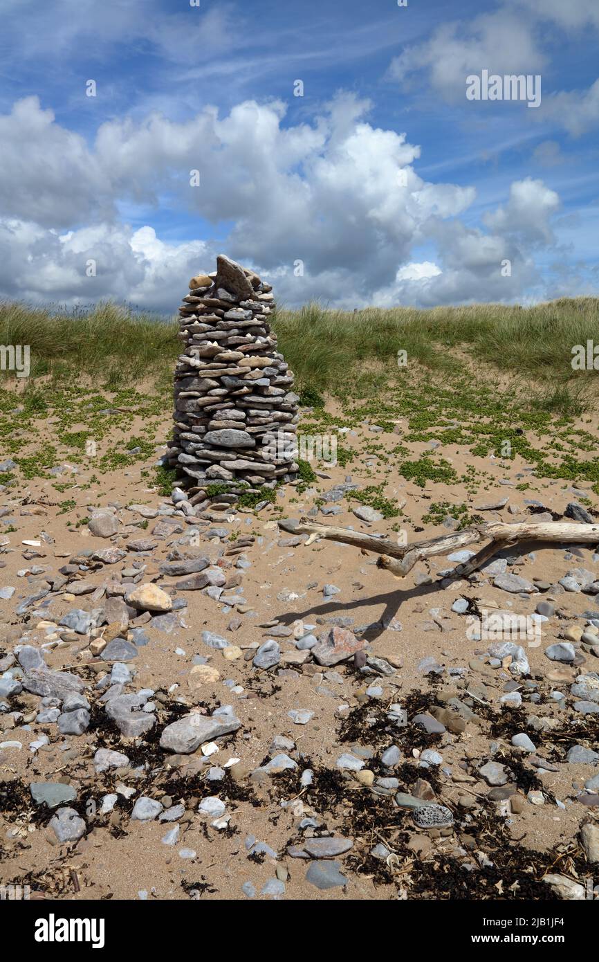A nice pillar of beach rocks made to form a conical pillar half way up ...