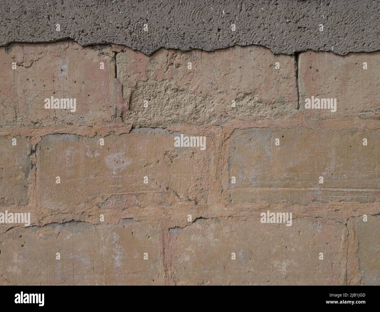 Texture of a stone wall with traces of cement and paint Stock Photo - Alamy