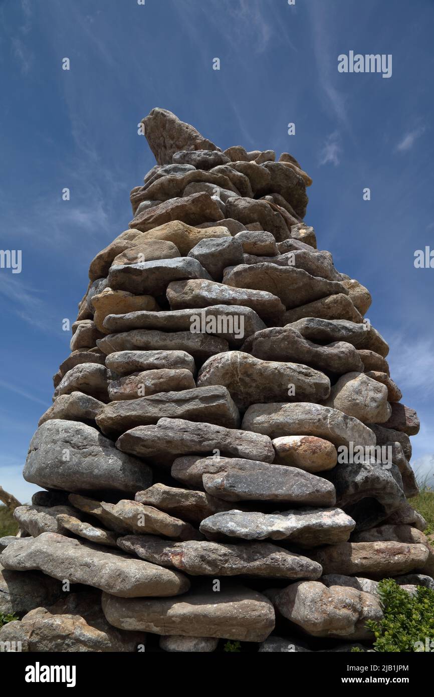 A nice pillar of beach rocks made to form a conical pillar half way up ...