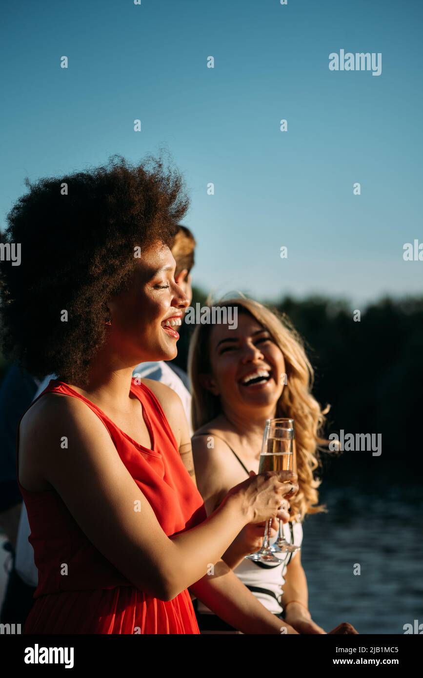 Group of friends having fun and celebrating group gathering outdoor ...