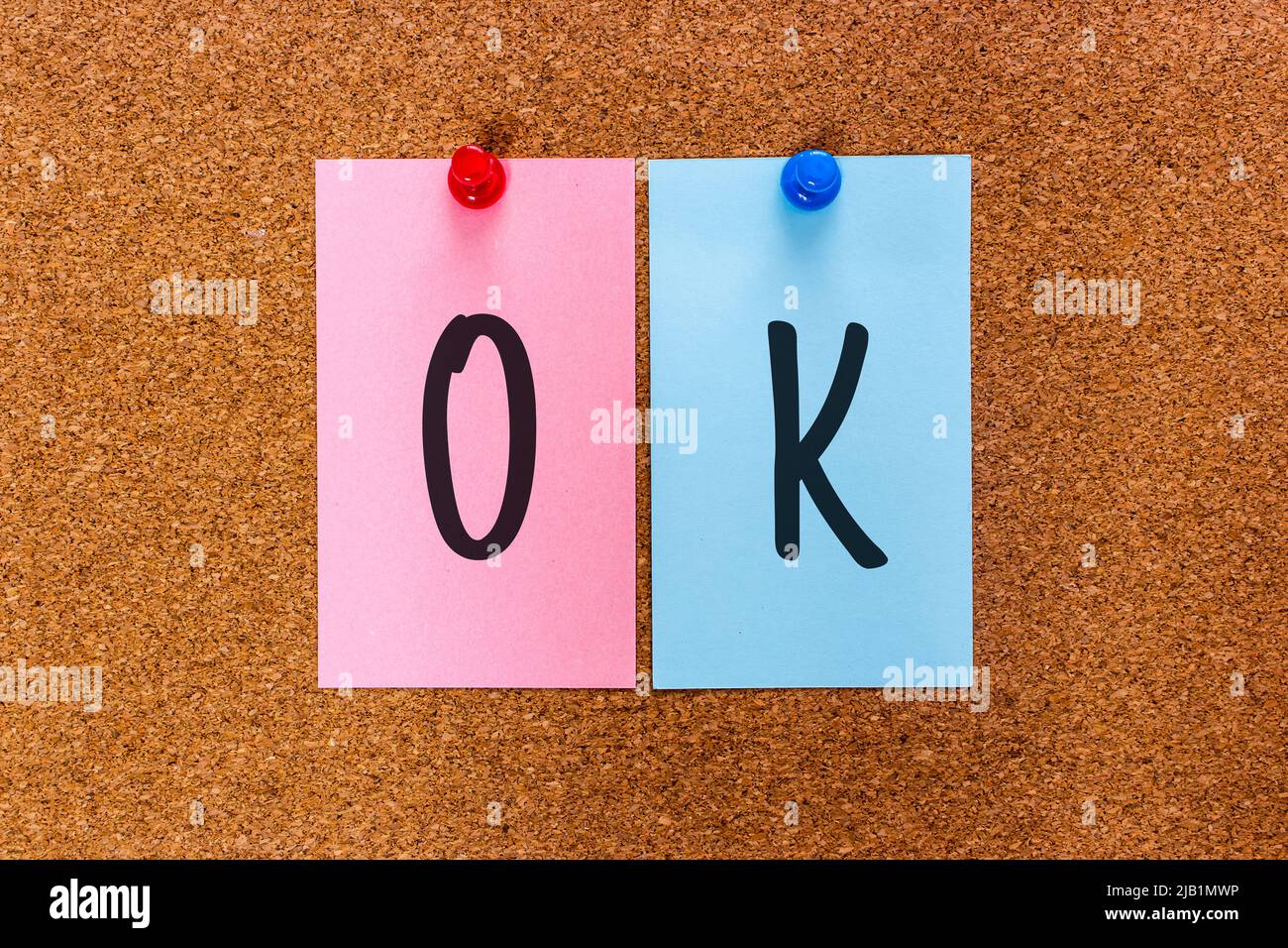 2 letters keyword OK (okay, O.K.) in handwriting on multicolored ...