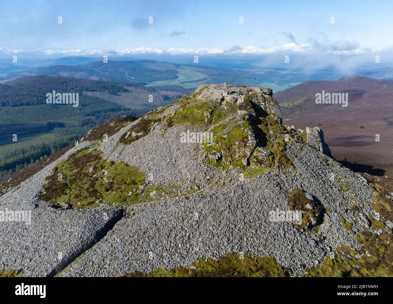Aerial photograph of the distinctive granite plug and hillfort remains ...