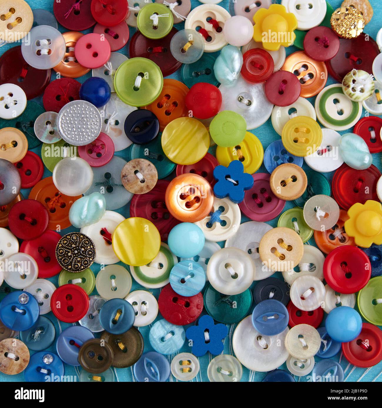 Background from multi-colored clothes buttons. Beautiful background for ...