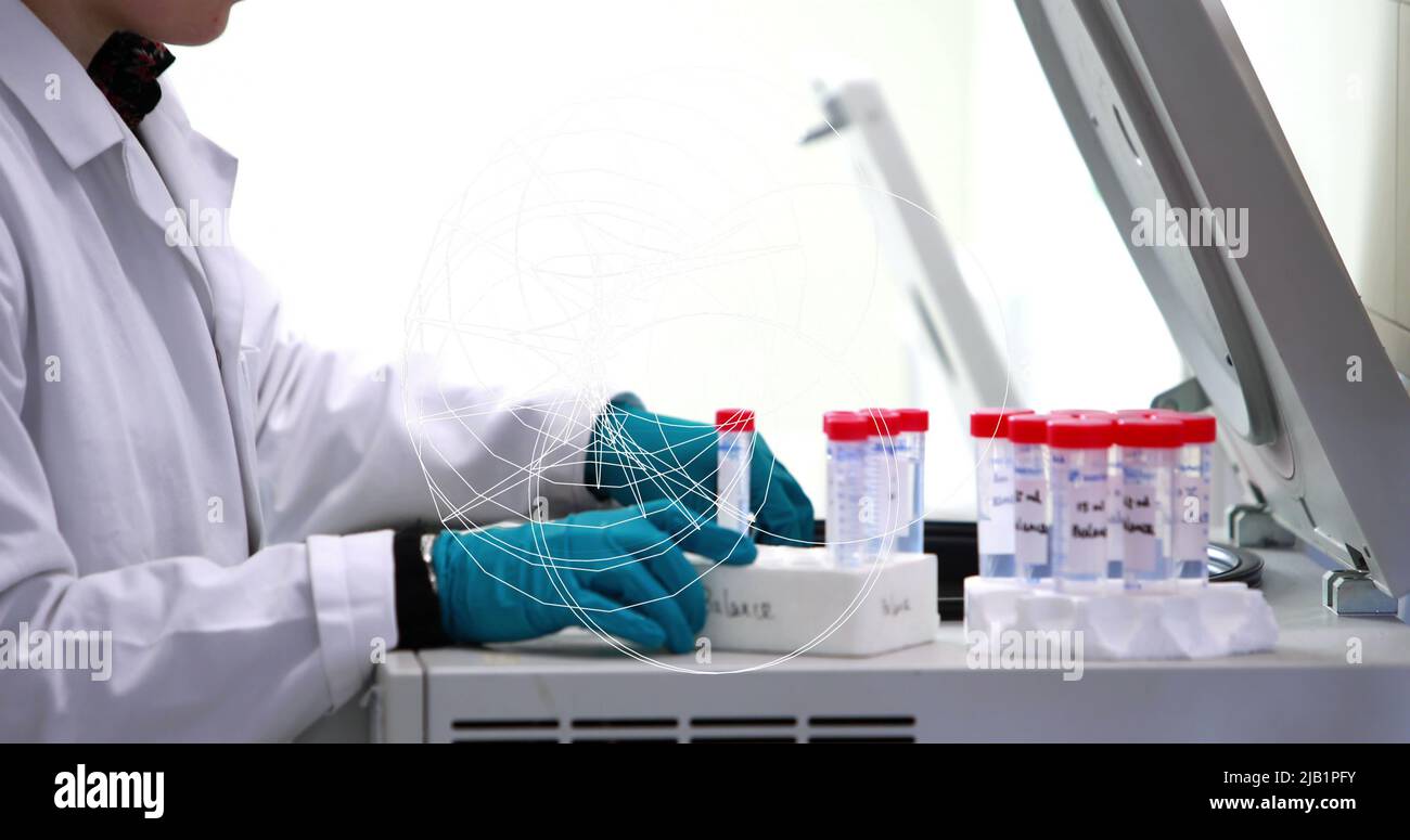 Image of circles spinning over male scientist in laboratory Stock Photo ...