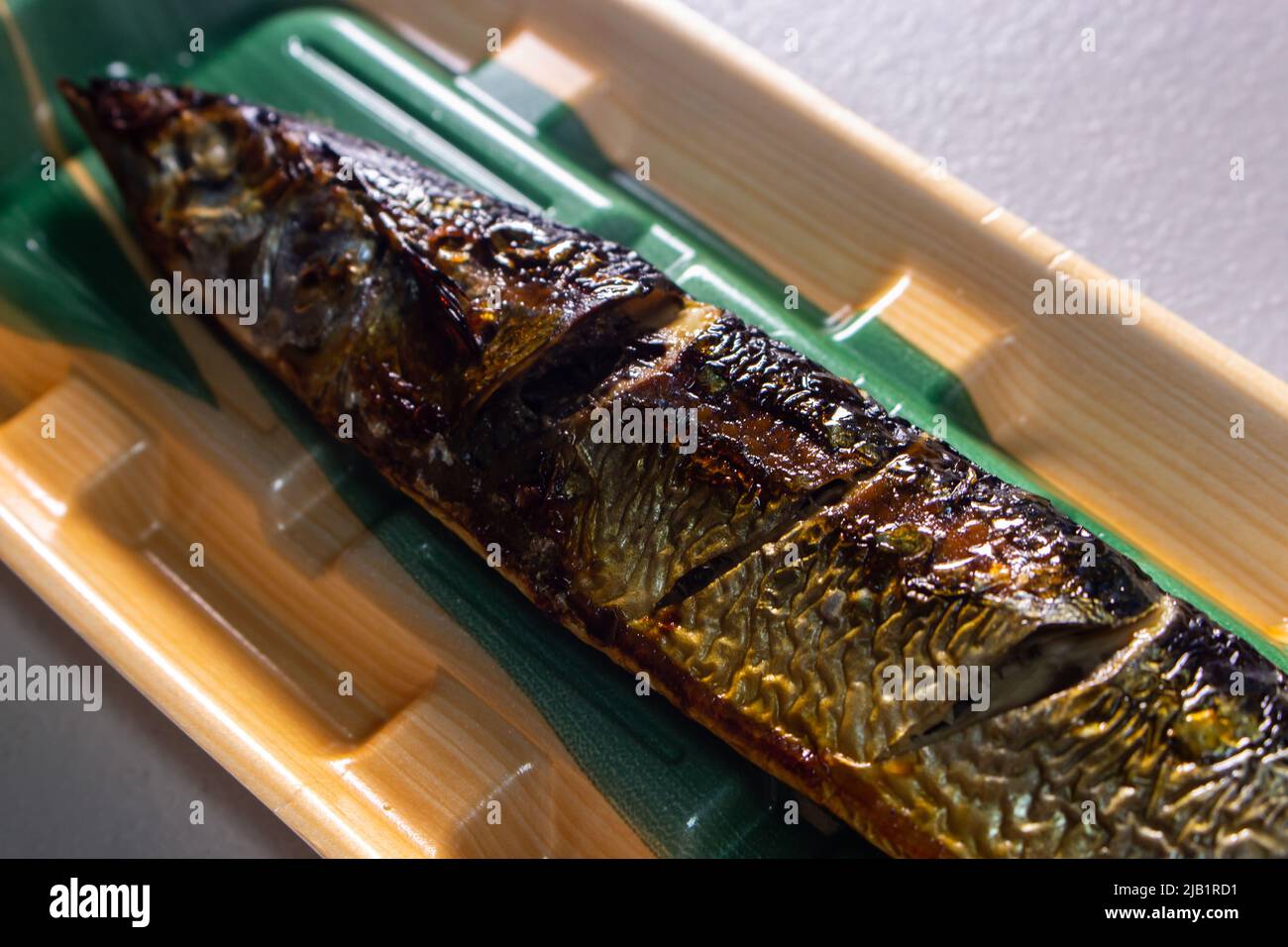 Closeup Grilled Japanese Sanma sold by Japanese supermarket. Pacific ...