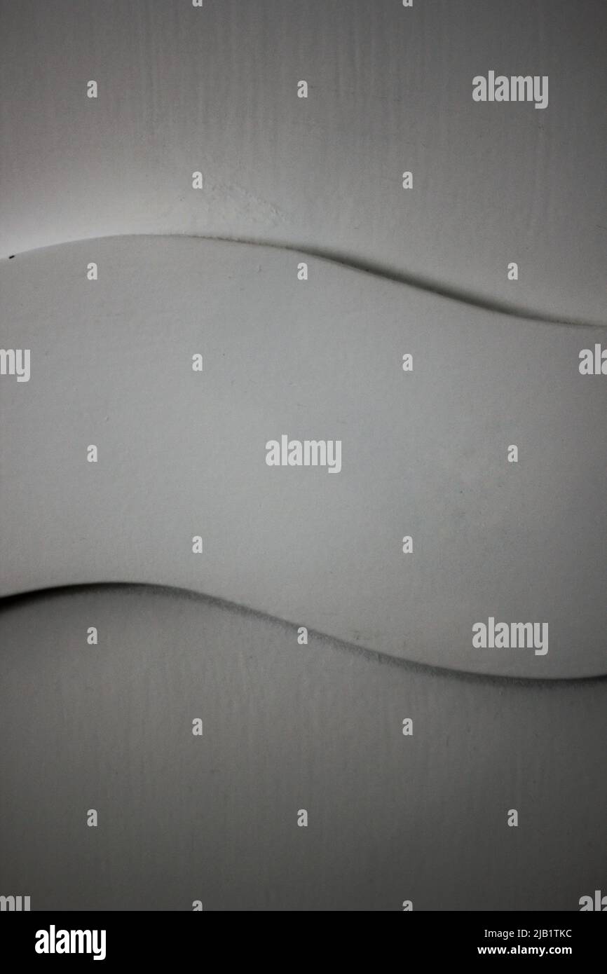 Simple elegant curving lines on a wall with a minimalist view Stock ...