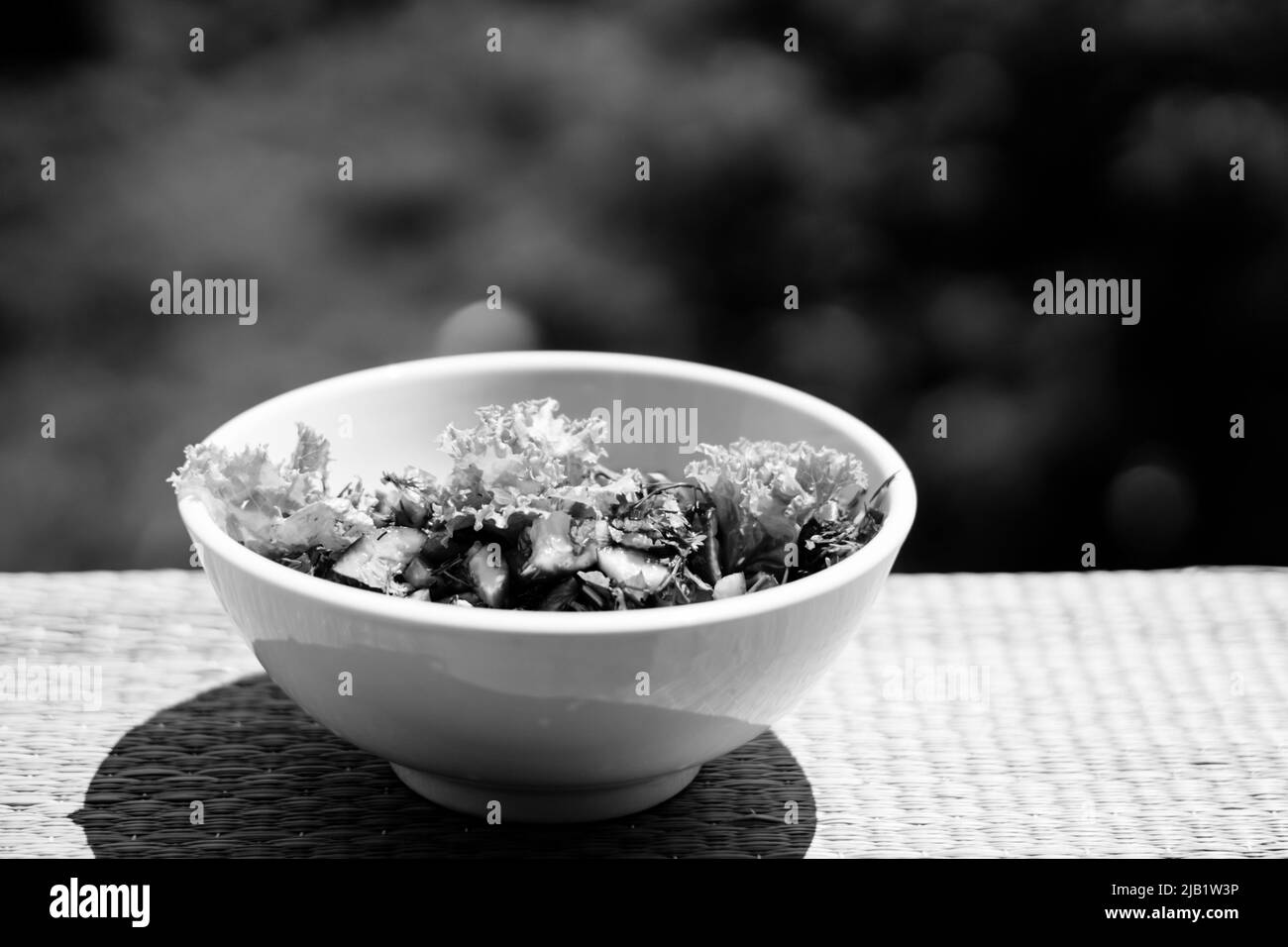 Ceramic white light bowl with mix lettuce leaves, spinach leaf salad ...