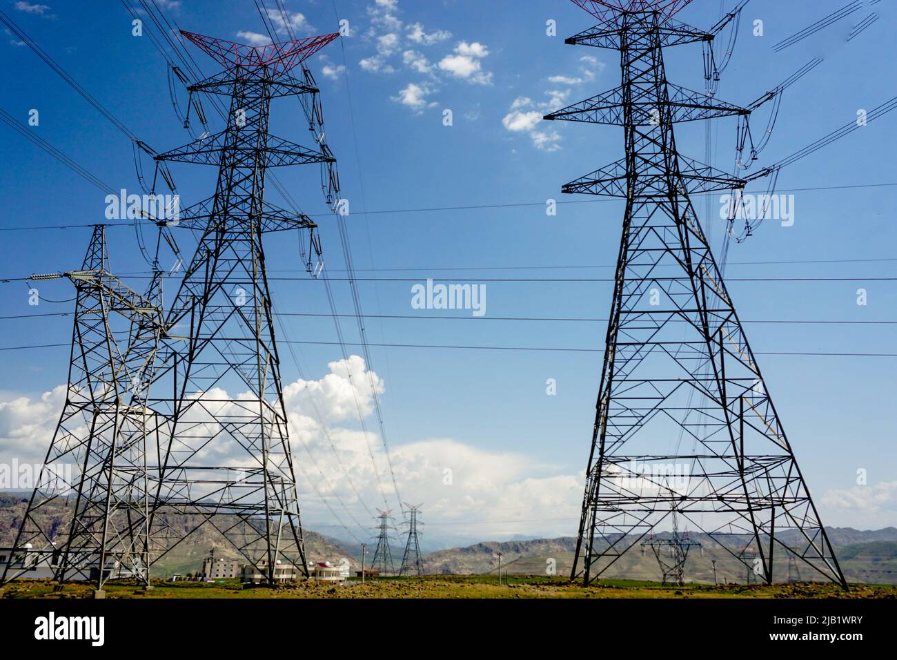 High voltage powerlines on the field Stock Photo - Alamy