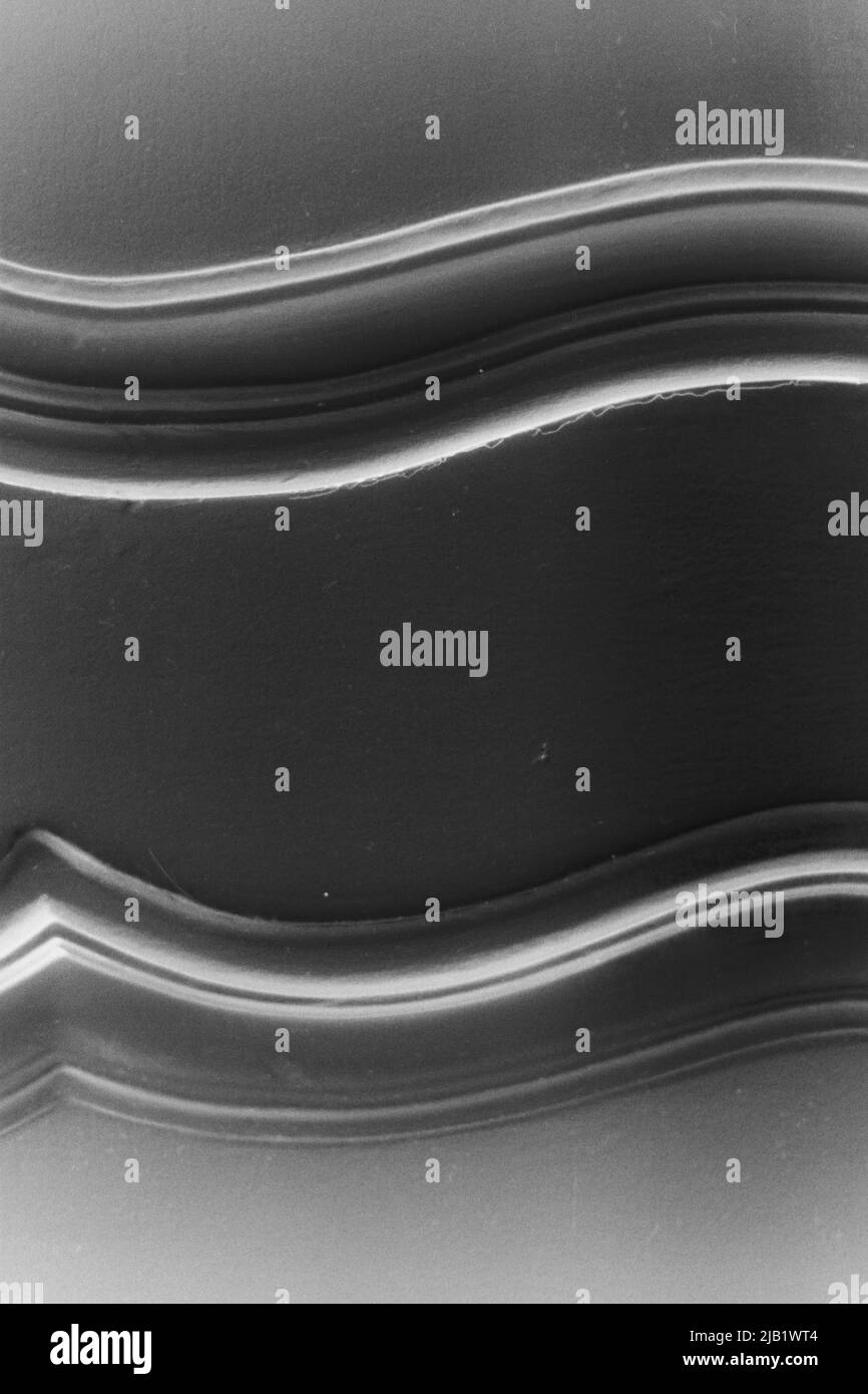 Simple elegant curving lines on a wall with a minimalist view in black ...