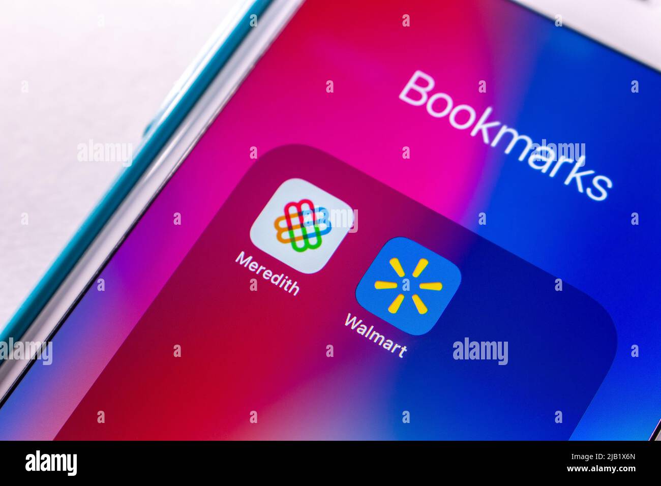 Icons of Meredith Corporation & Walmart on iPhone. In Sep 2021, Walmart ...