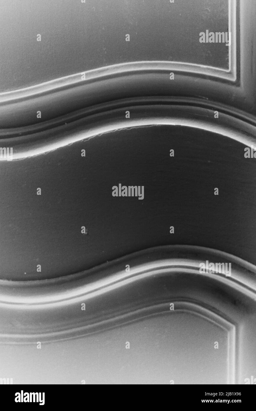 Simple elegant curving lines on a wall with a minimalist view in black ...