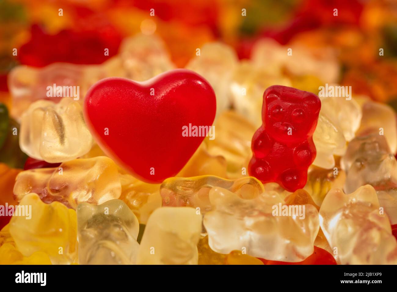 I love Concept - Red Heart with Gummy Bear Stock Photo - Alamy