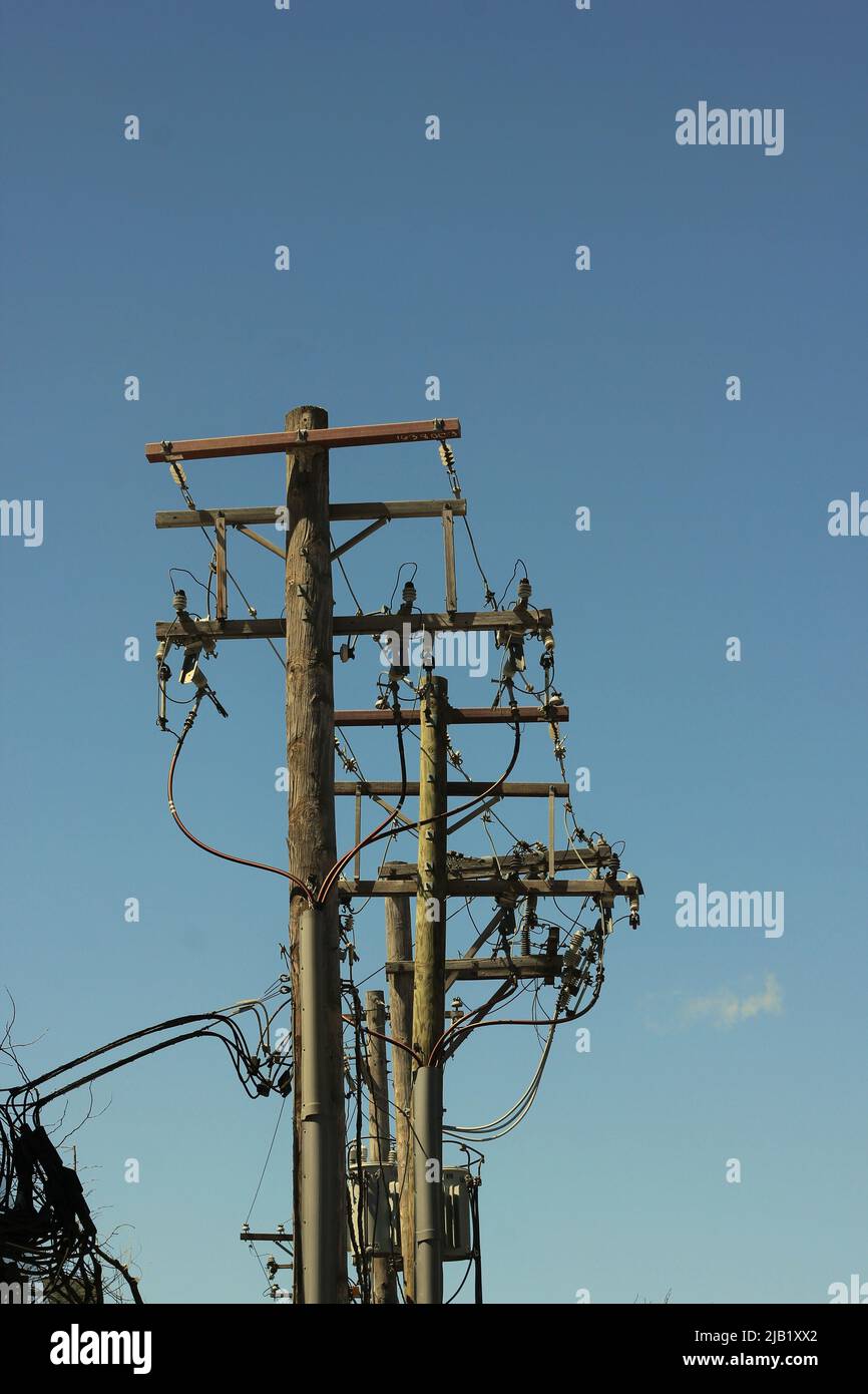 Tall power tower with lots of wires and cables Stock Photo - Alamy