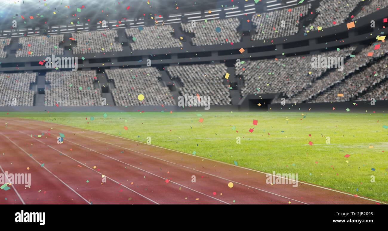 Image of confetti falling over sports stadium Stock Photo - Alamy