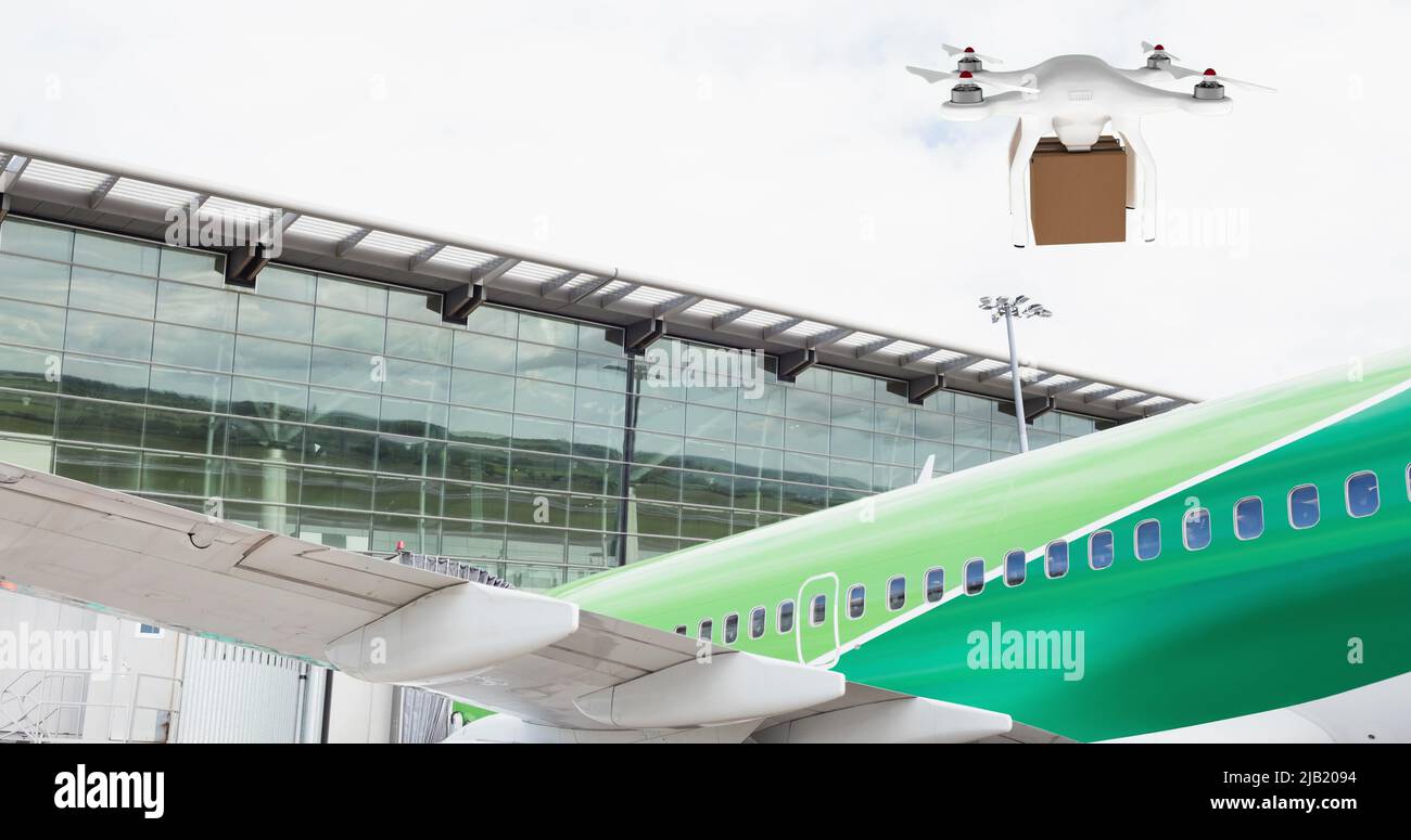 Drone carrying a box in an airport Stock Photo - Alamy
