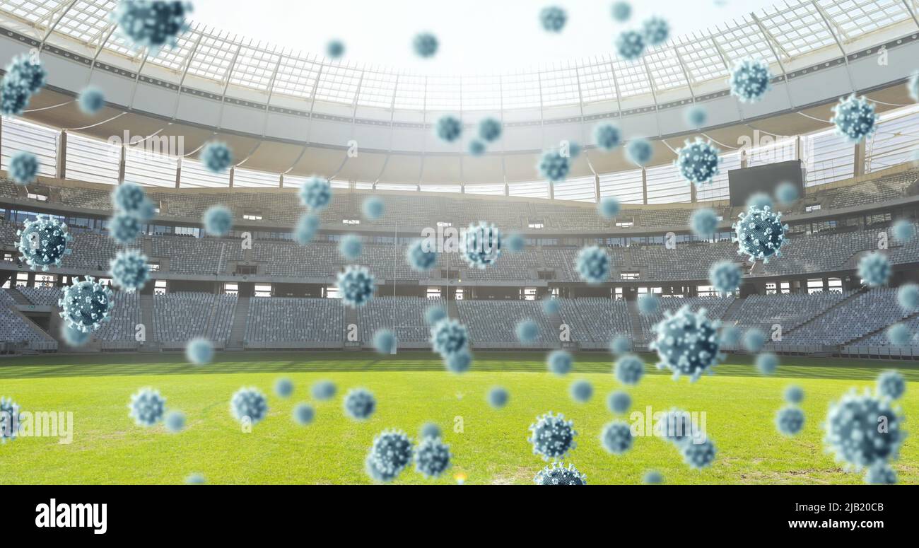 Covid-19 cells against empty sports stadium Stock Photo - Alamy