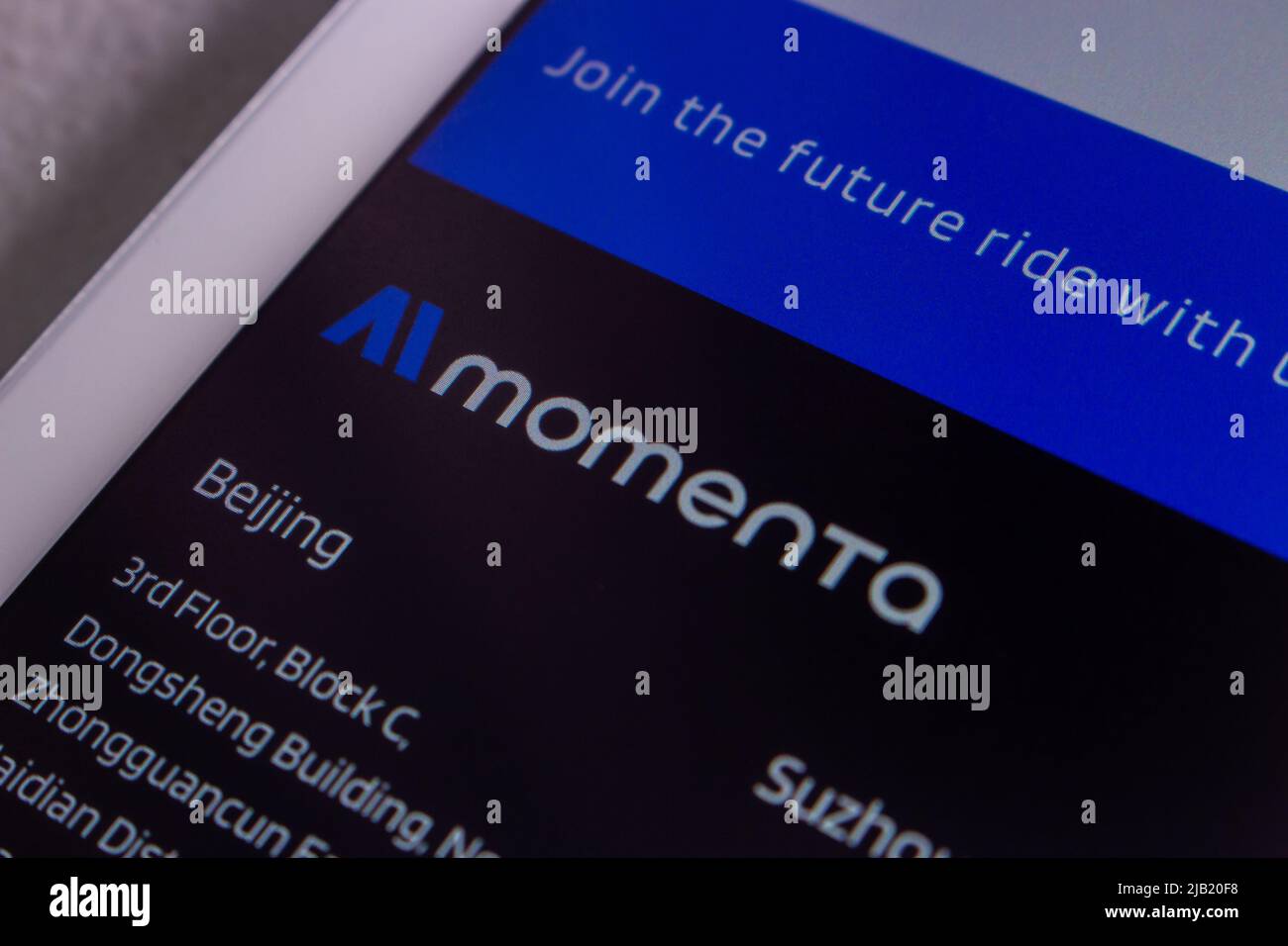 Kumamoto, JAPAN - Nov 15 2021 : Closeup logo of Momenta, an autonomous ...