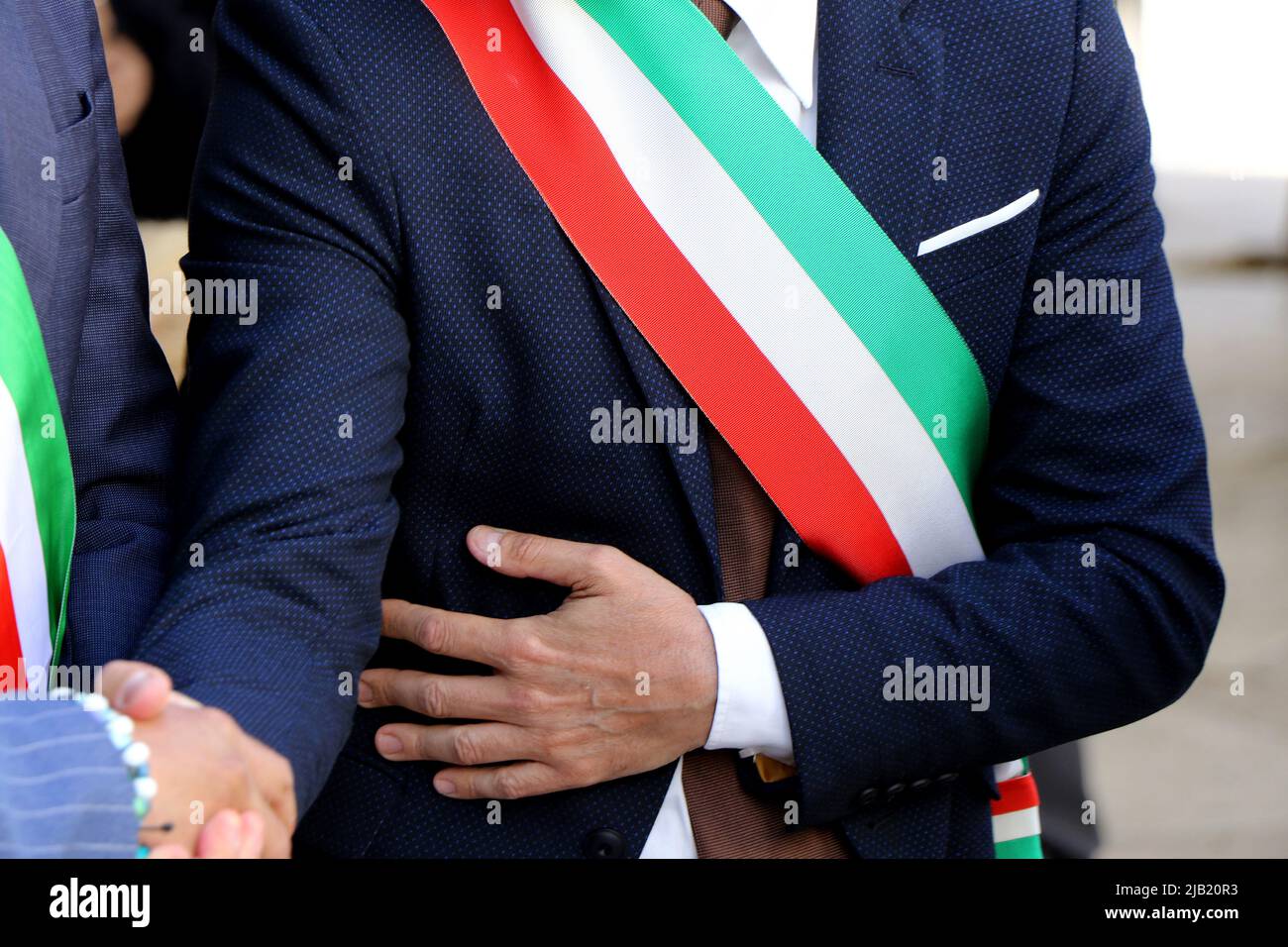 Close-up on the tricolor band of the Italian mayor. Italian politics ...