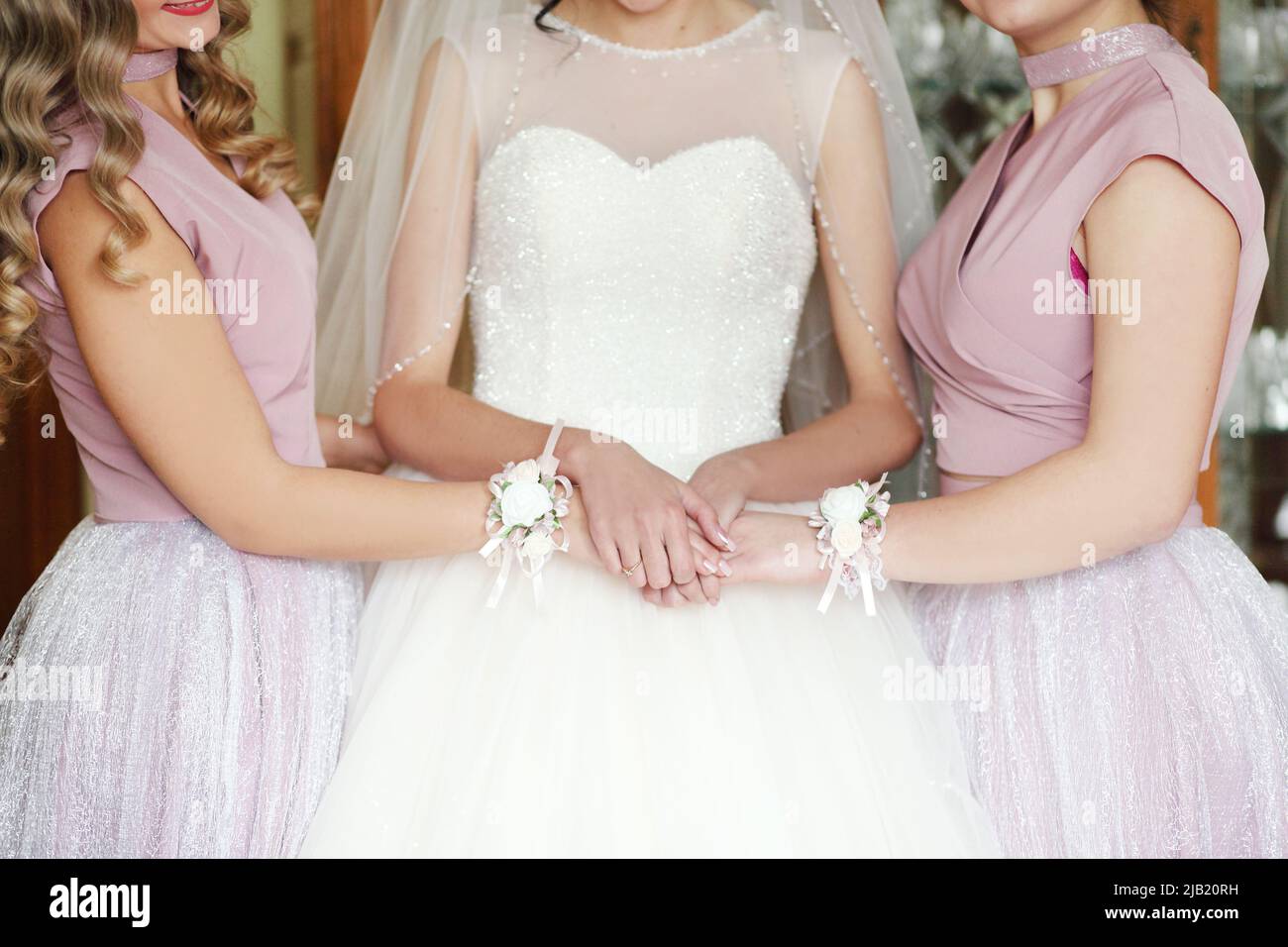 Bride and girlfriends hug in the room. Morning Bride and girlfriends ...