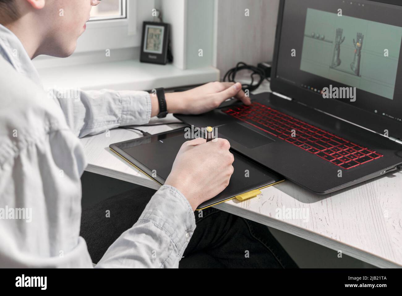 digital artist working on 3d graphics using a graphics tablet Stock ...