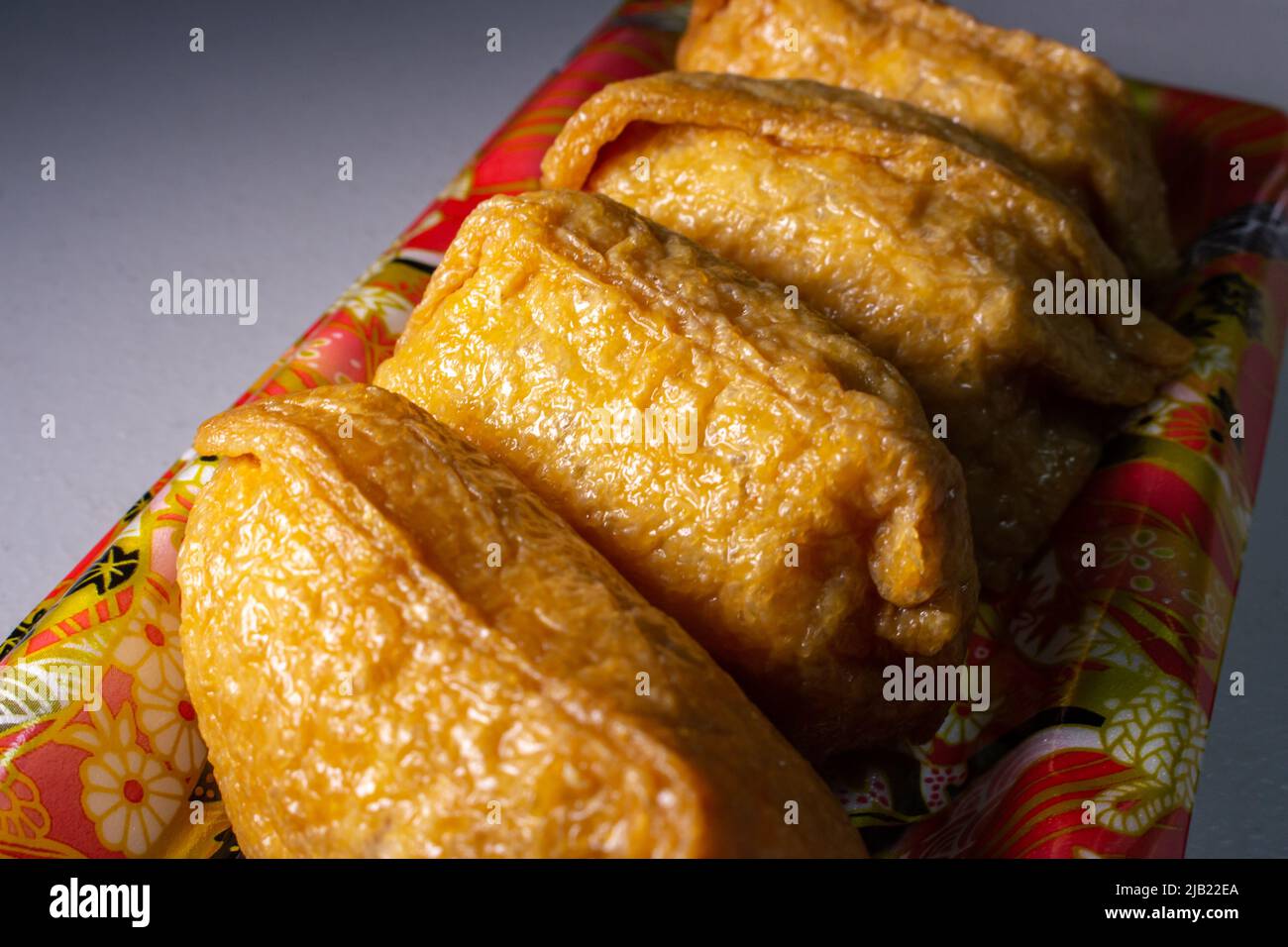 Closeup takeout Inarizushi (Inari sushi or fox sushi), a type of Sushi ...