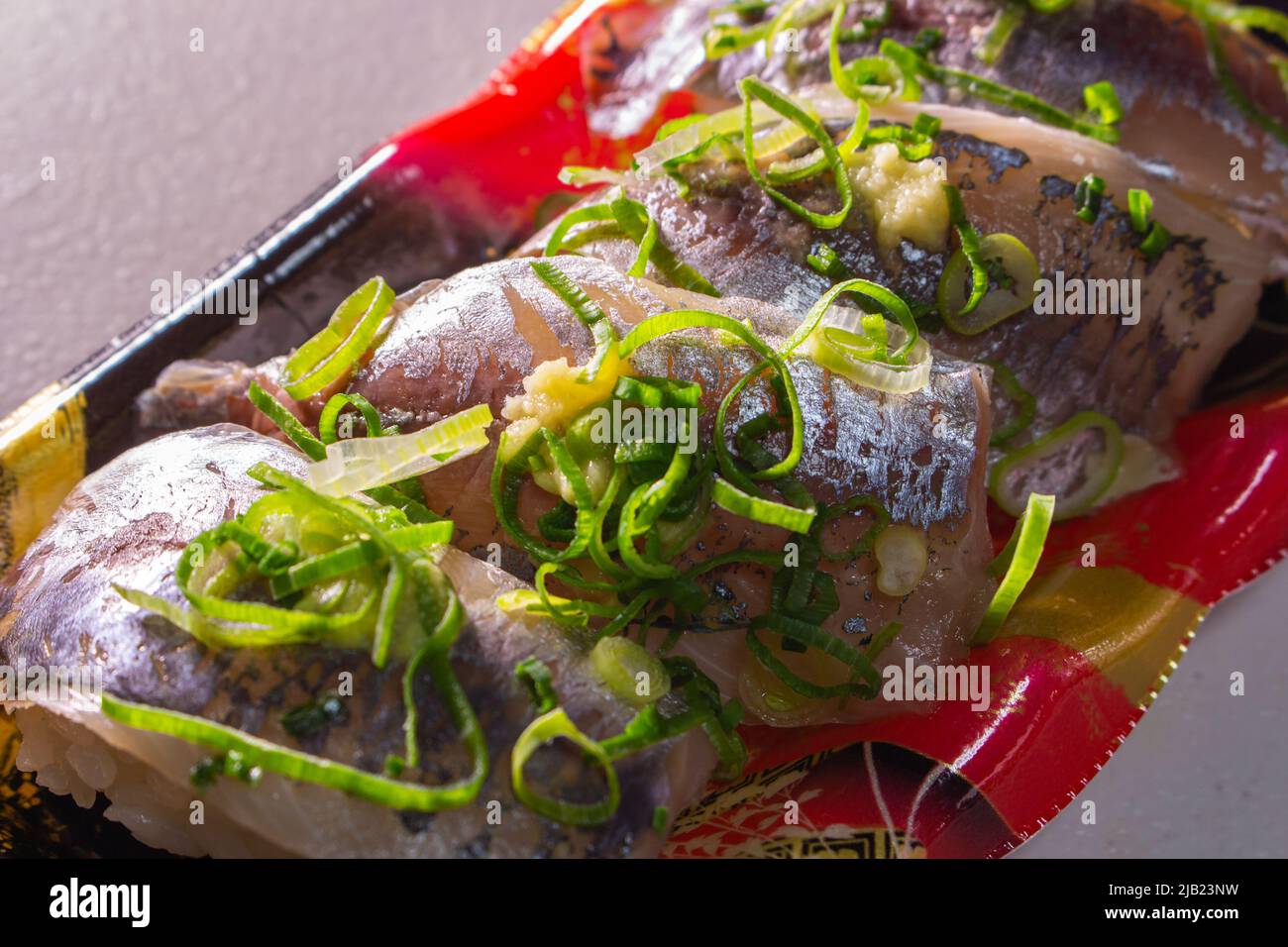 Horse Mackerel Sushi (Aji Sushi) with green onions & grated ginger ...
