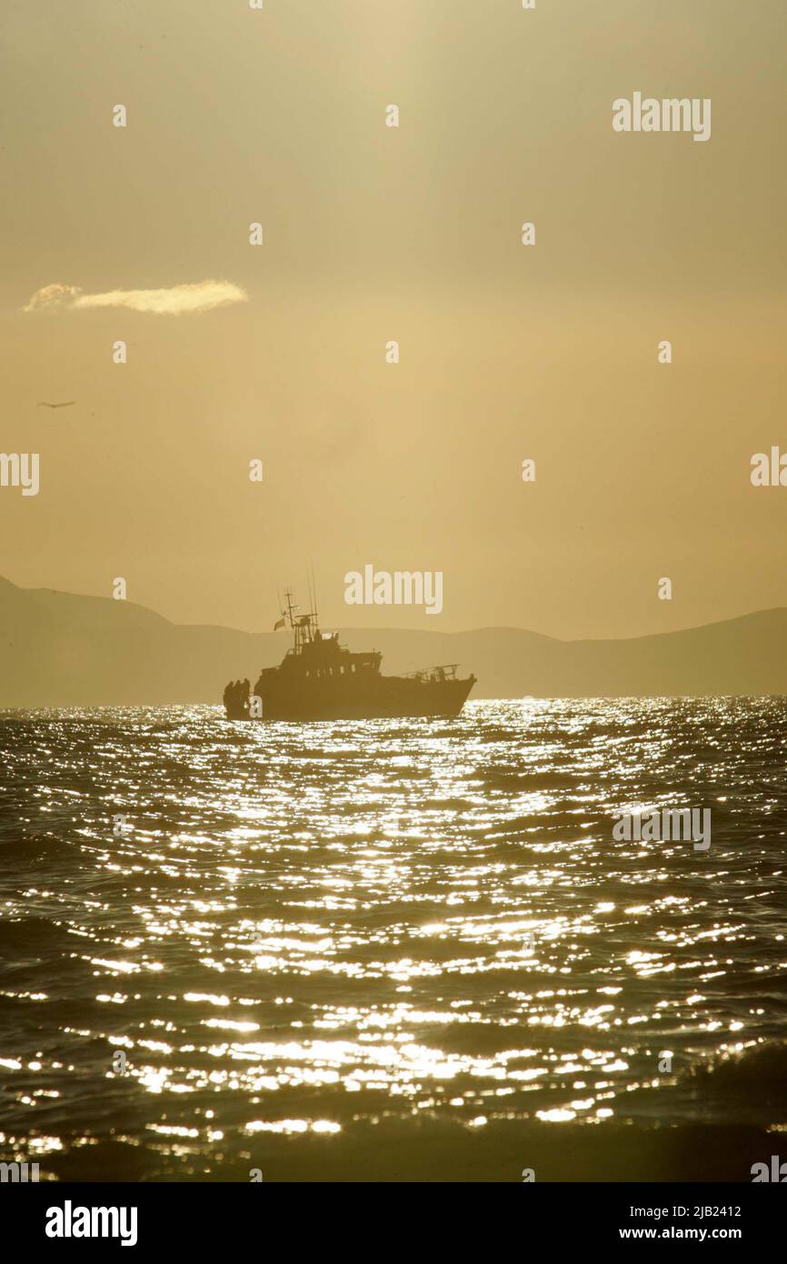 Troon, Ayrshire, Scotland, UK. Troon lifeboat returns to its home port ...