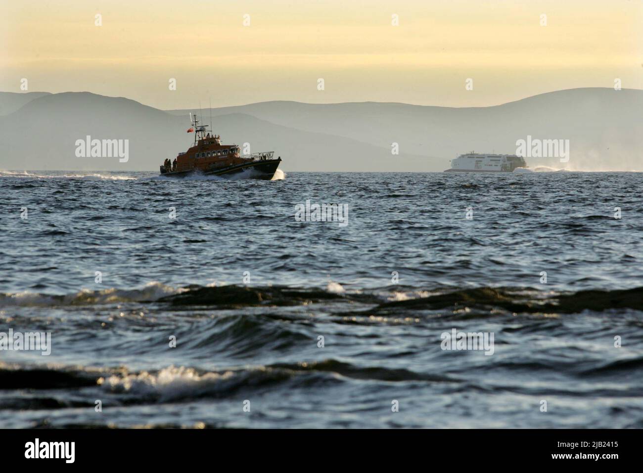 Troon, Ayrshire, Scotland, UK. Troon lifeboat returns to its home port ...