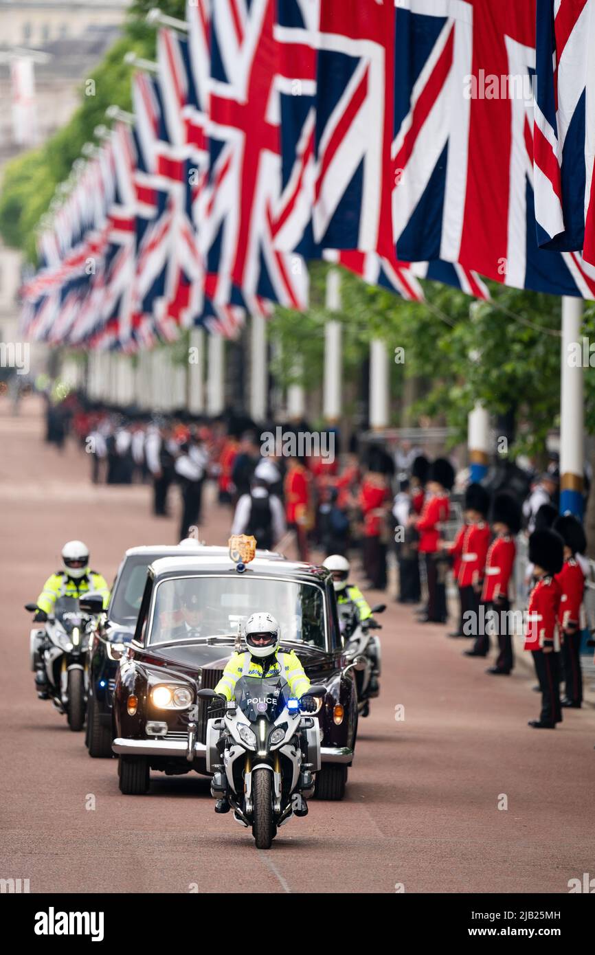 A car in the Royal Procession leaves Buckingham Palace for the Trooping ...