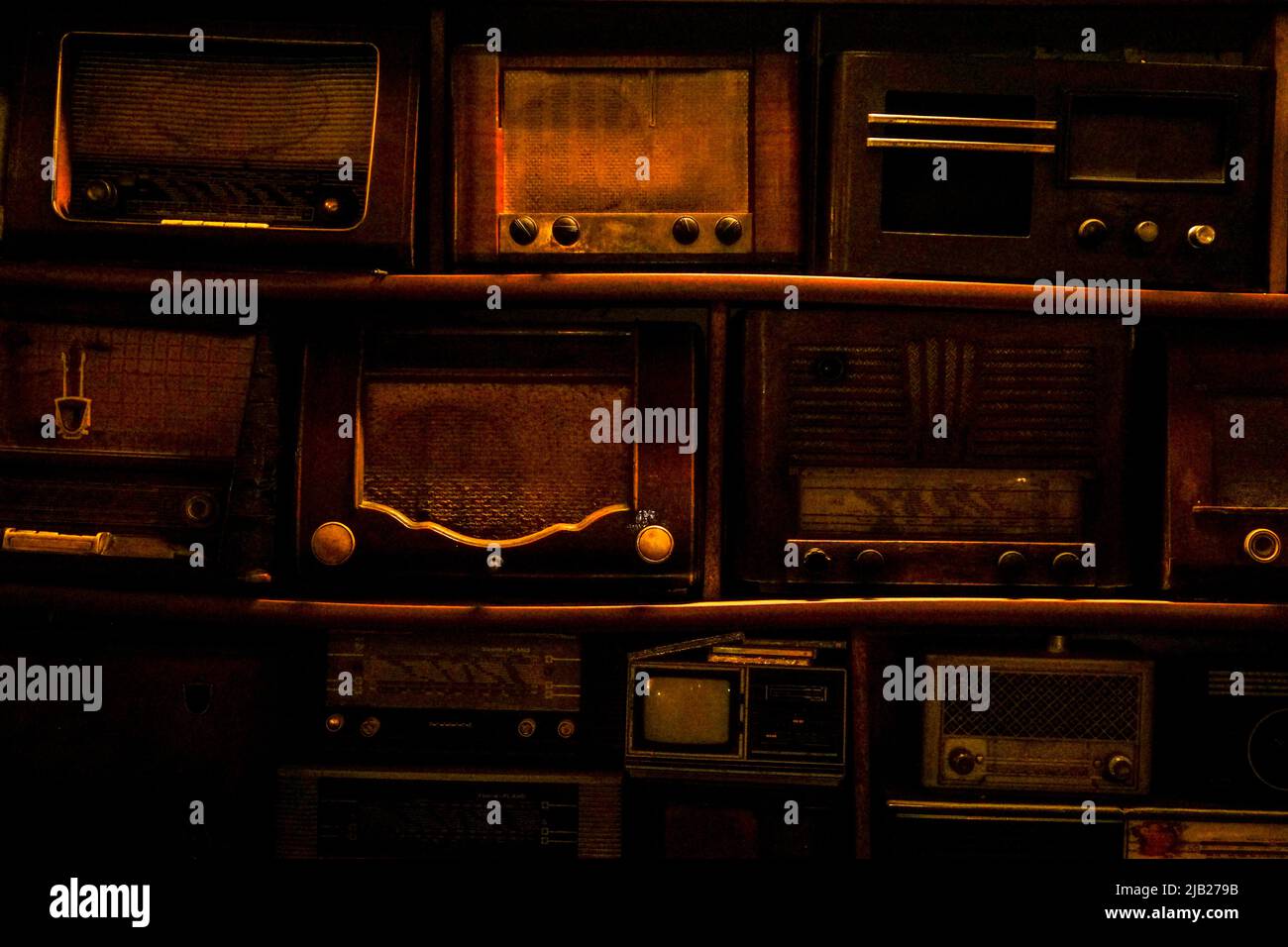 Stacked old radios background Stock Photo - Alamy