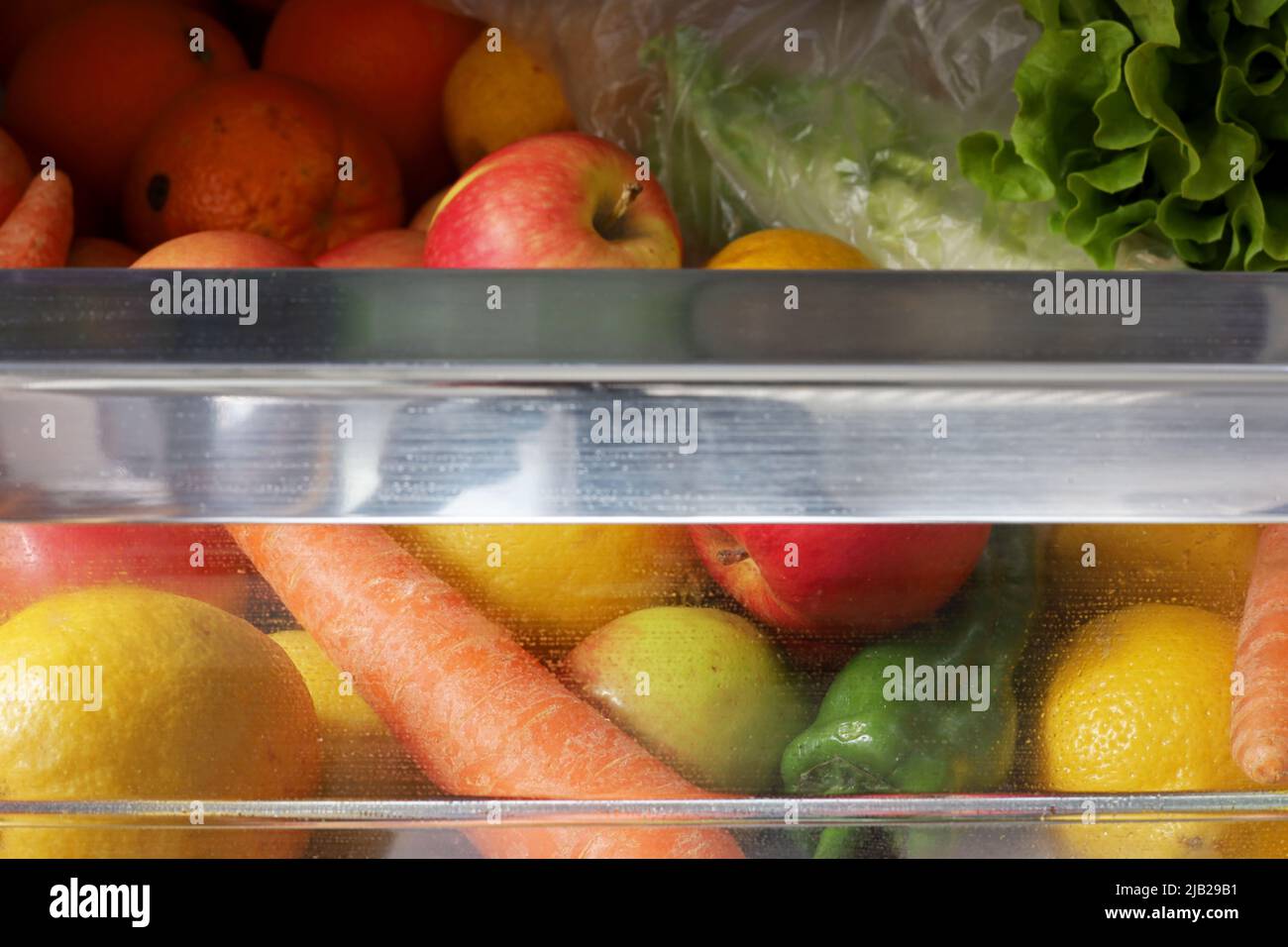 fruit and vegetables in a refrigerator Stock Photo - Alamy