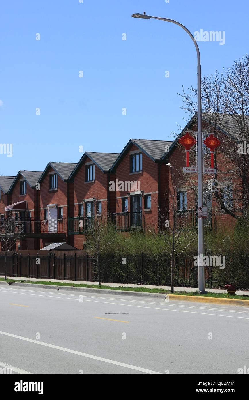 Typical row houses lining a city street Stock Photo - Alamy