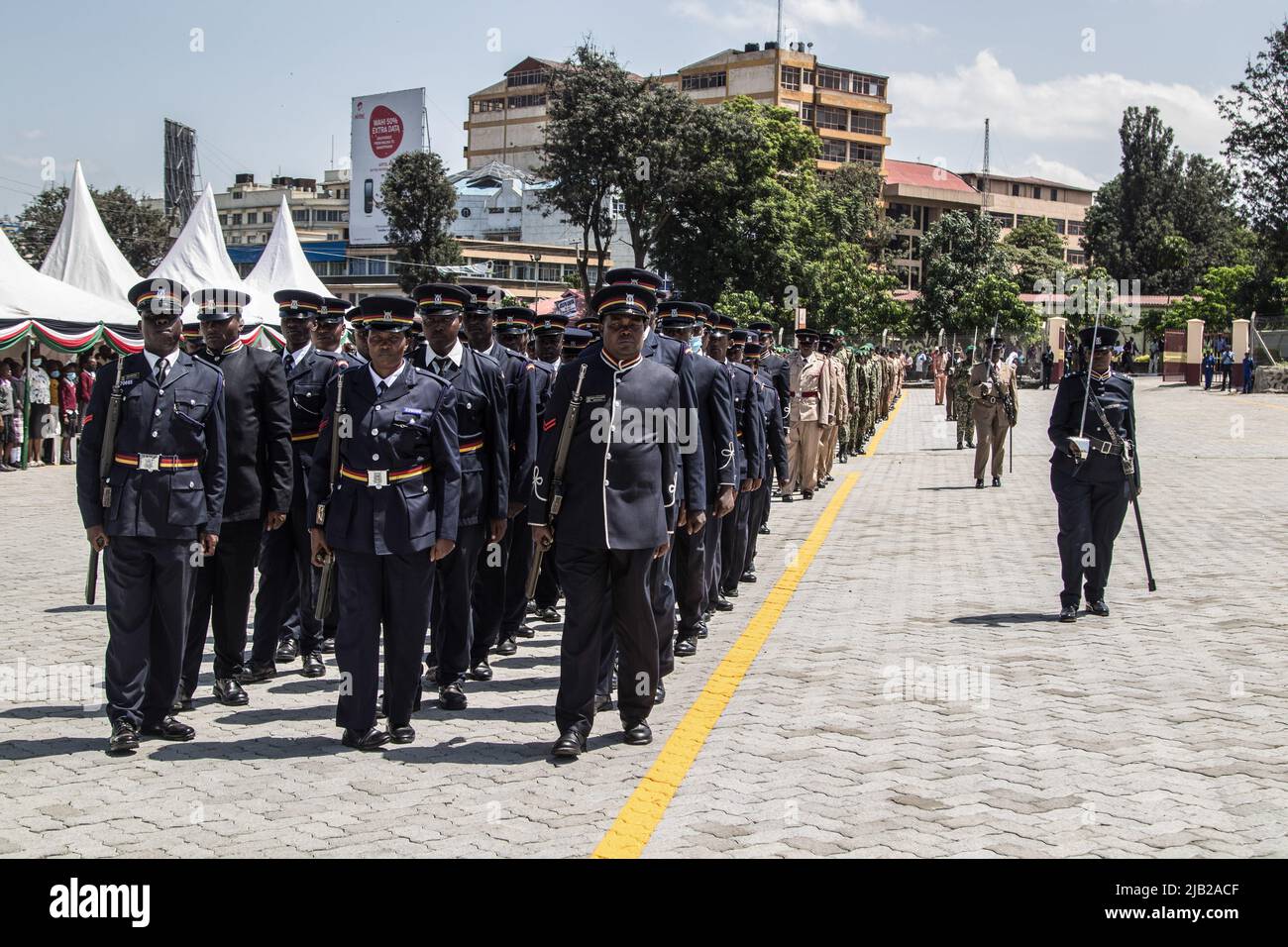 Kenyan police officers are seen in their ceremonial uniforms at a ...