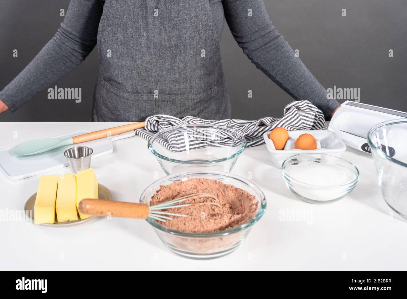 Ingredients in mixing bowls on the counter to bake chocolate cookies ...