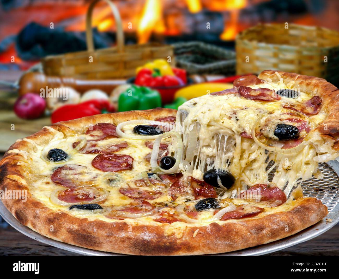 Pepperoni pizza slice melted mozzarella cheese Stock Photo - Alamy