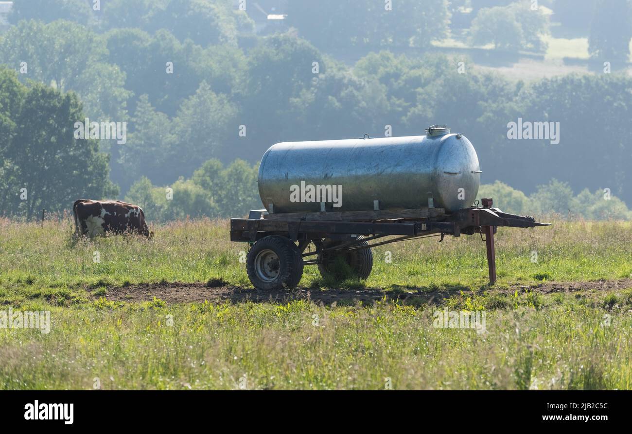 Metallic water tank, supply for cattle livestock in a field in the ...