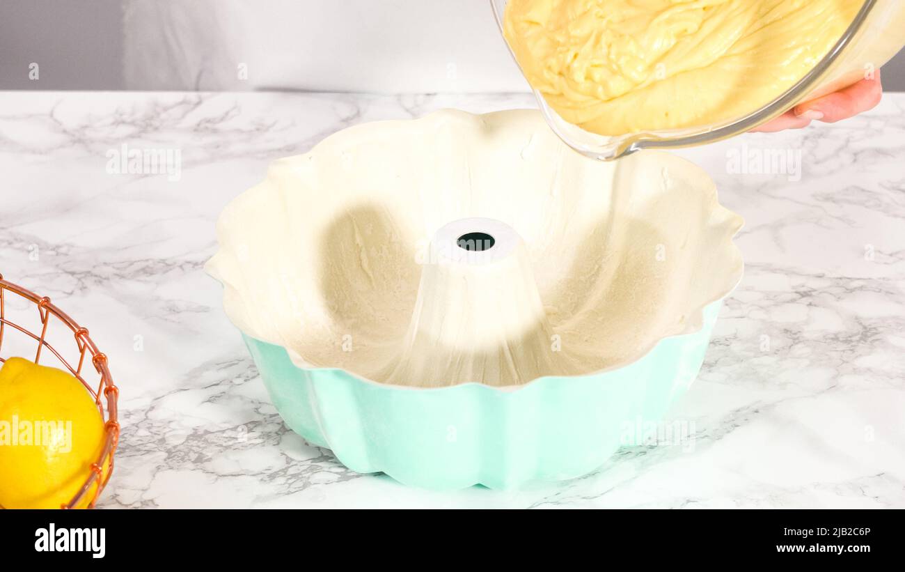 Step by step. Pouring cake batter in bundt cake pan ready for baking ...