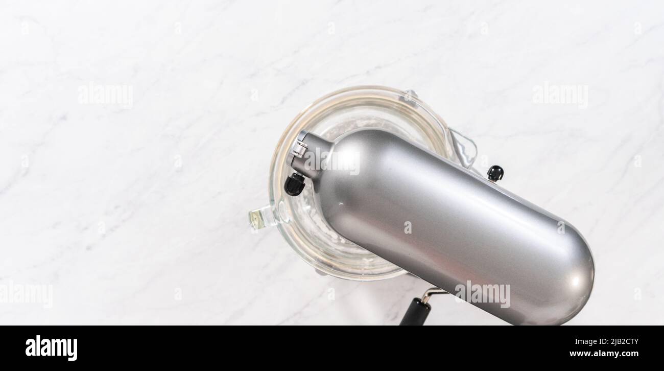 Flat lay. Mixing bread dough in a stand-alone kitchen mixer to bake ...