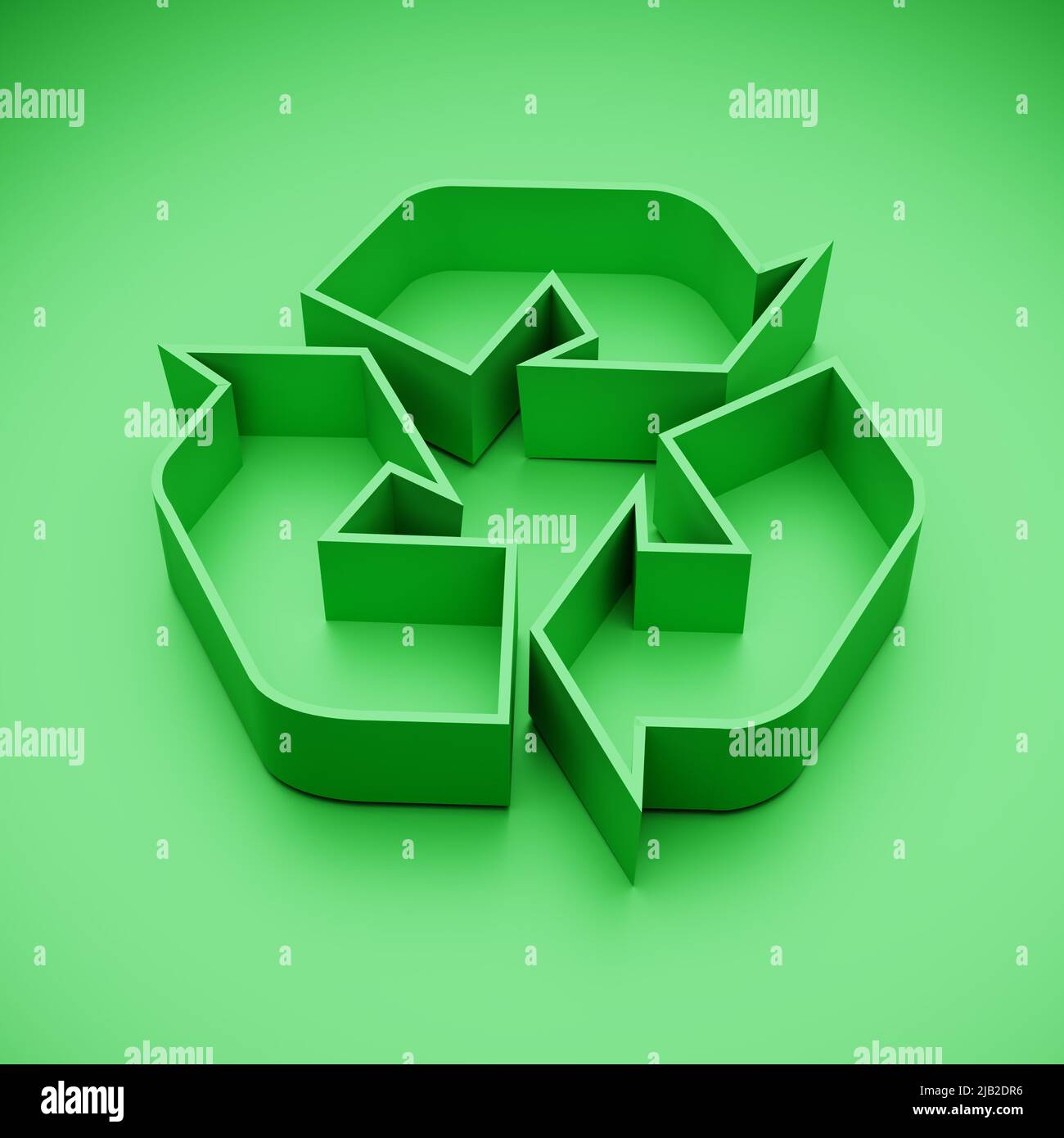 Green recycling logo in 3d on green background Stock Photo - Alamy