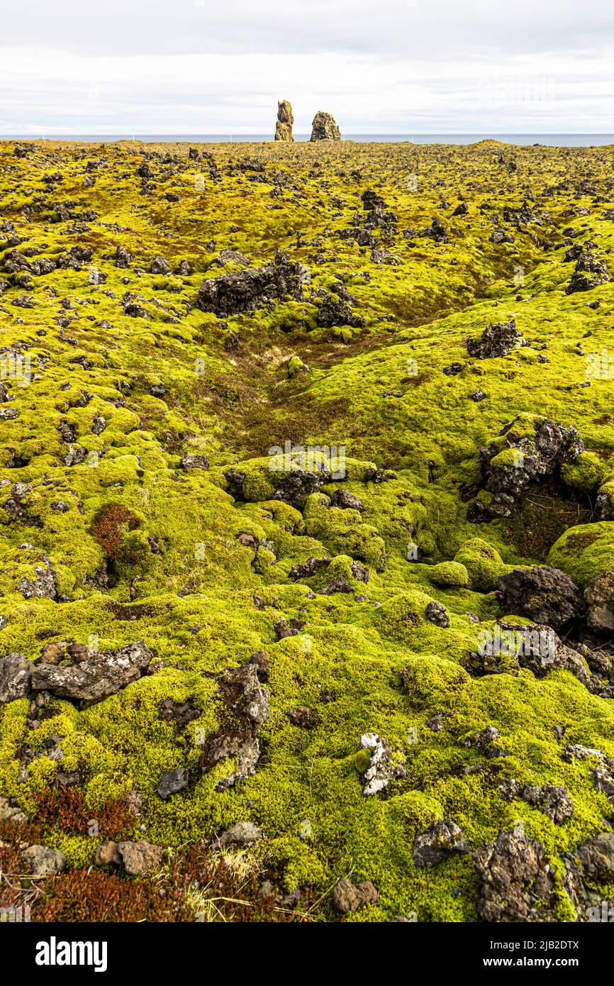 Lóndrangar, a pair of natural towers overlooking the ocean, comprised ...