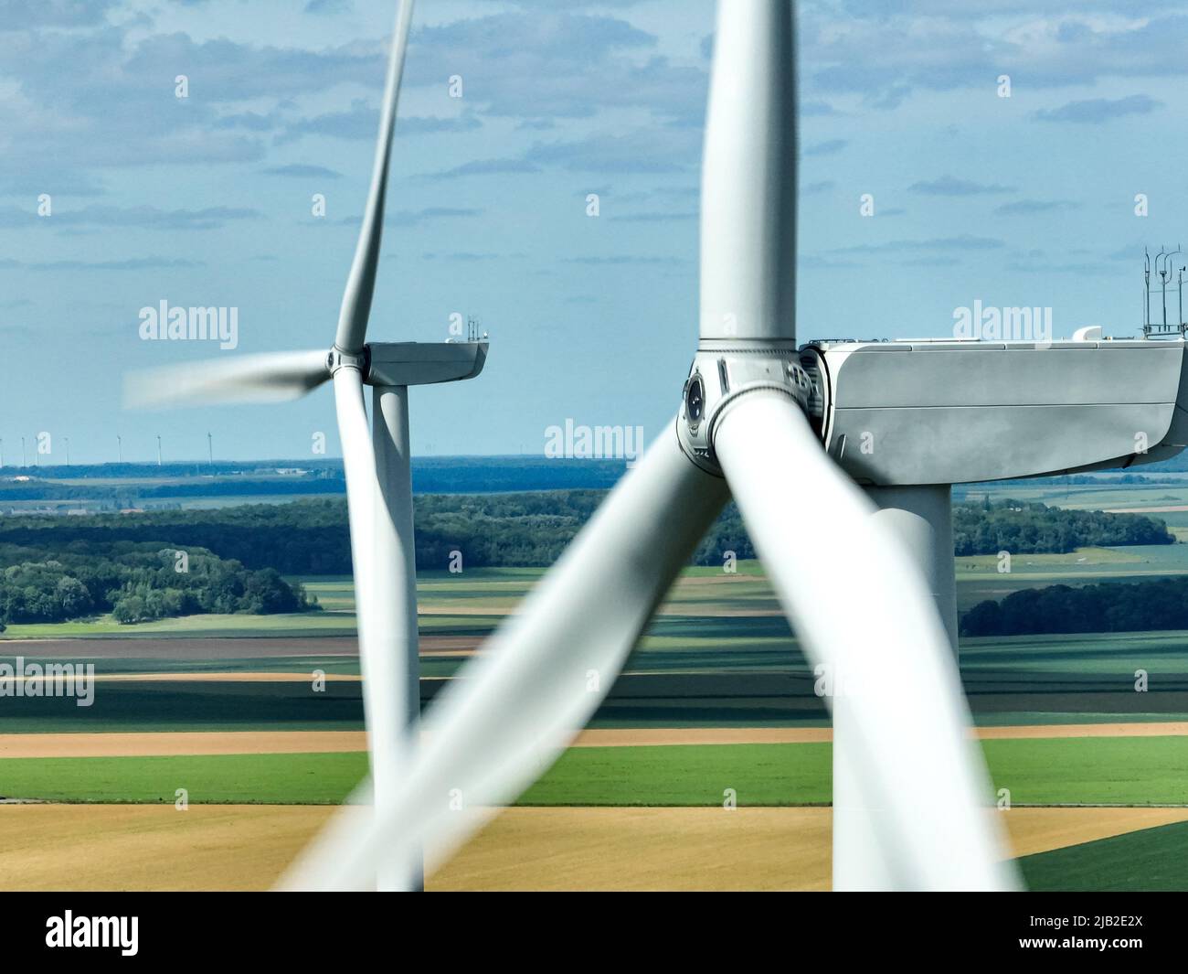 An up-close look at a wind turbine showcasing the synergy between ...