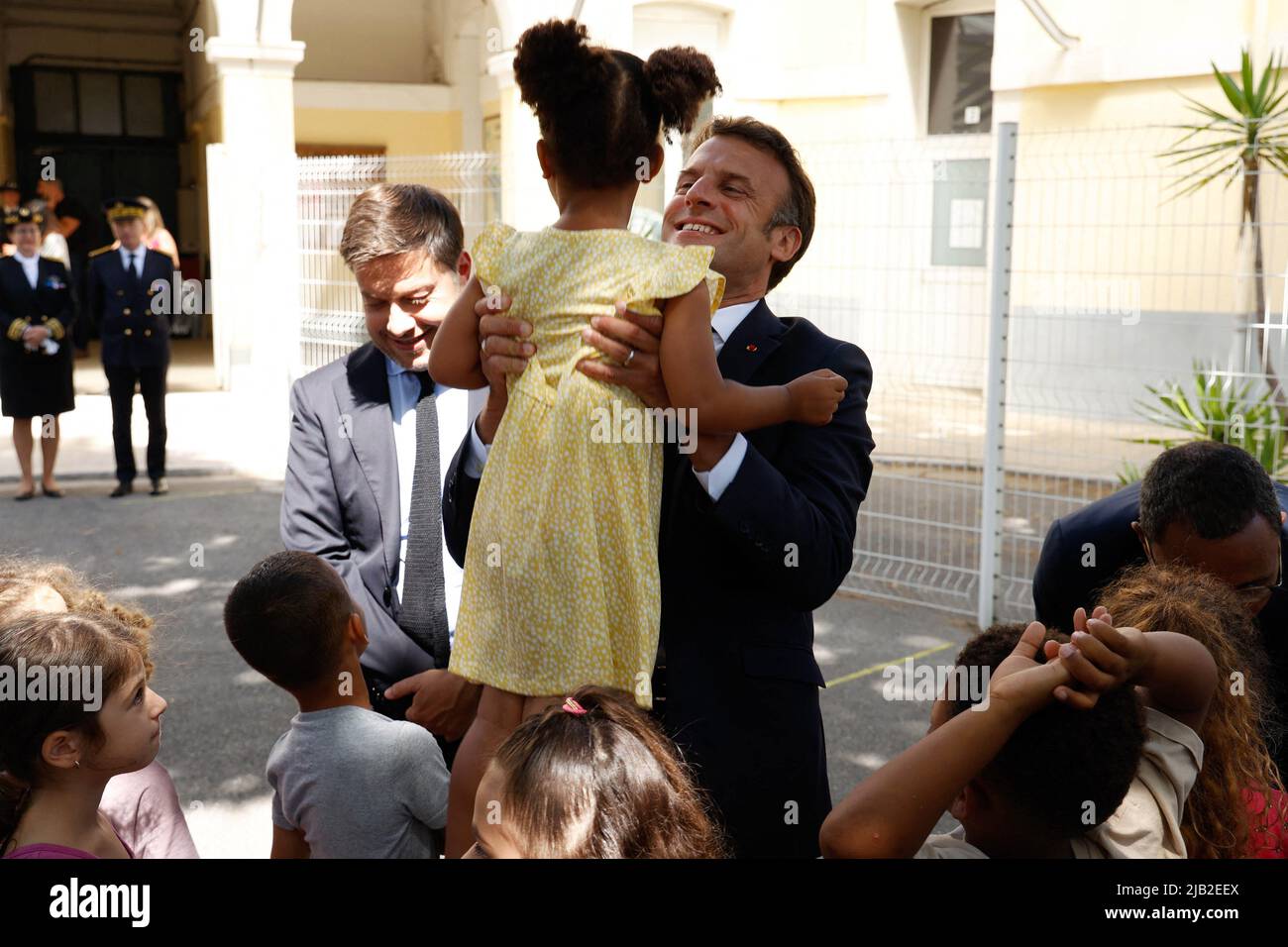 French President Emmanuel Macron during a visit to the Menpenti school ...