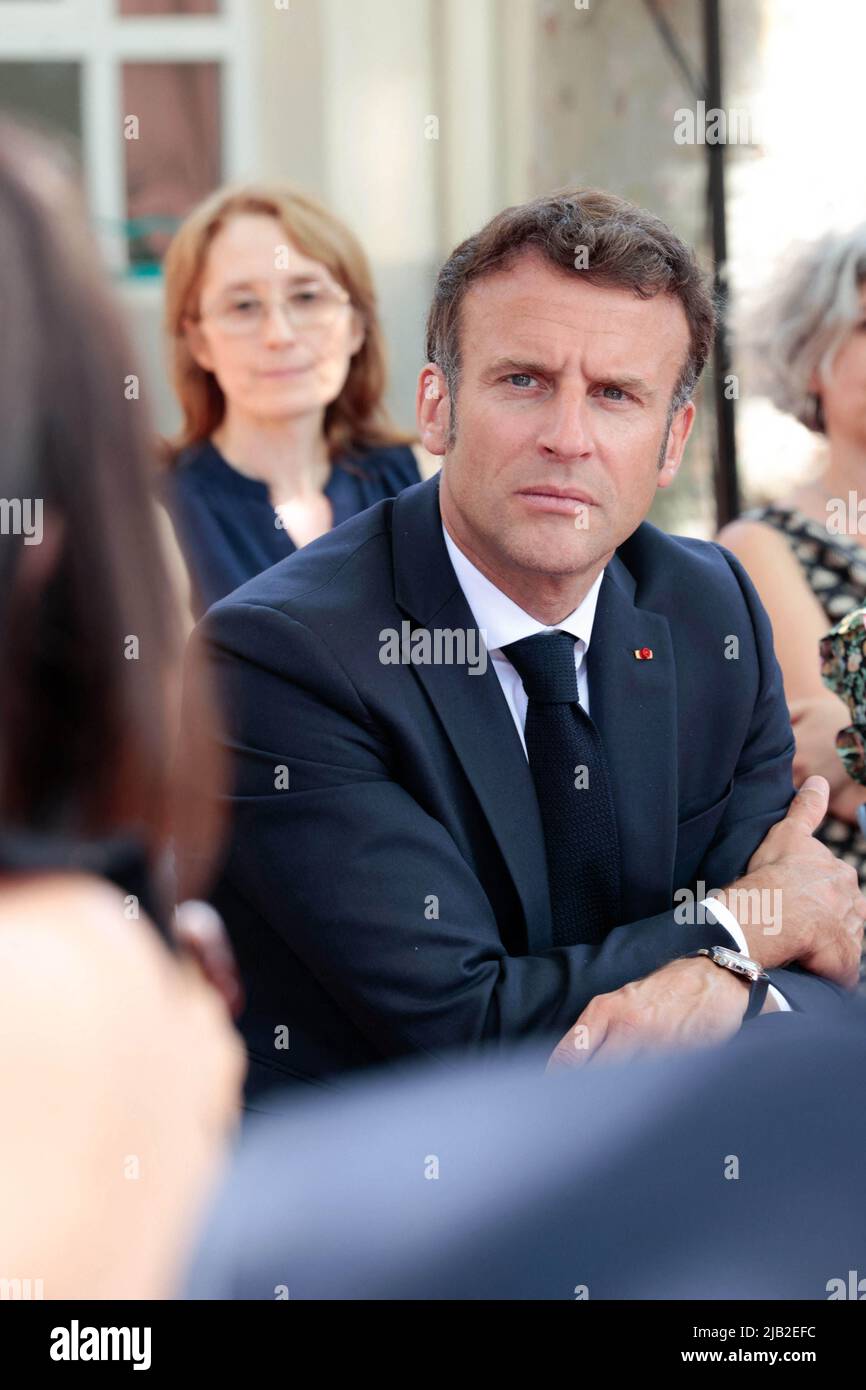 French President Emmanuel Macron during a visit to the Menpenti school ...