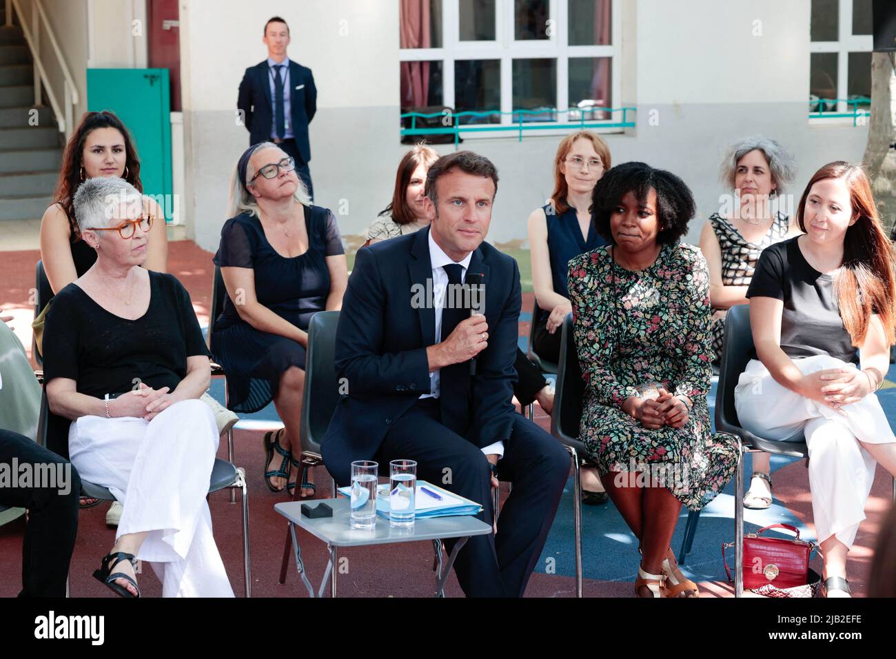 French President Emmanuel Macron during a visit to the Menpenti school ...