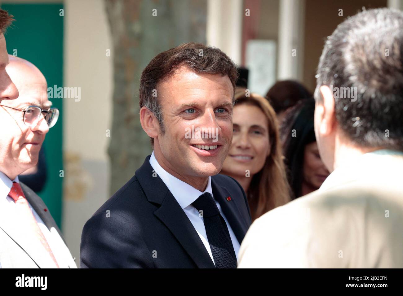 French President Emmanuel Macron during a visit to the Menpenti school ...