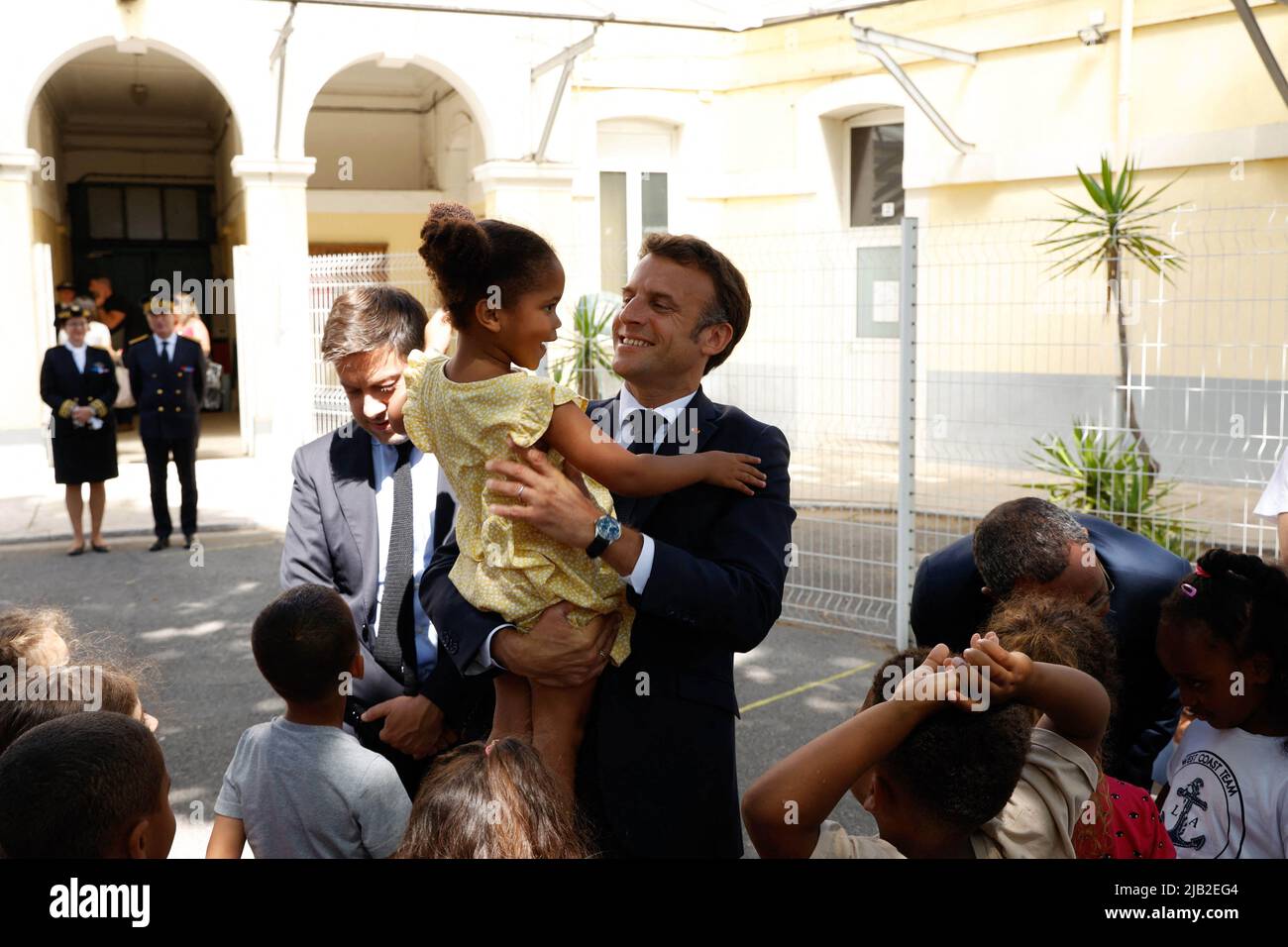 French President Emmanuel Macron during a visit to the Menpenti school ...