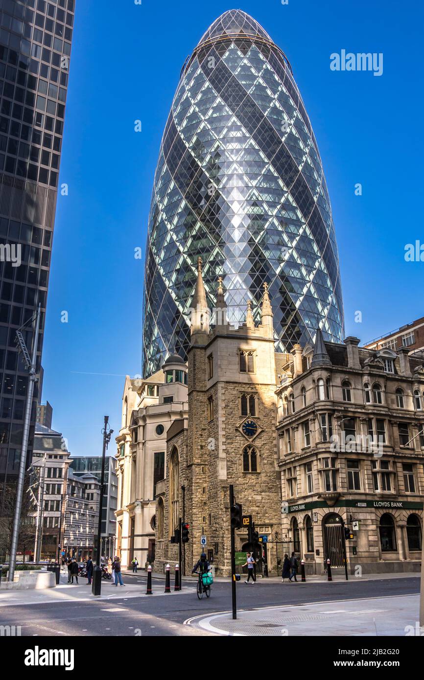 St Andrew Undershaft Church and The Gherkin, a commercial skyscraper ...
