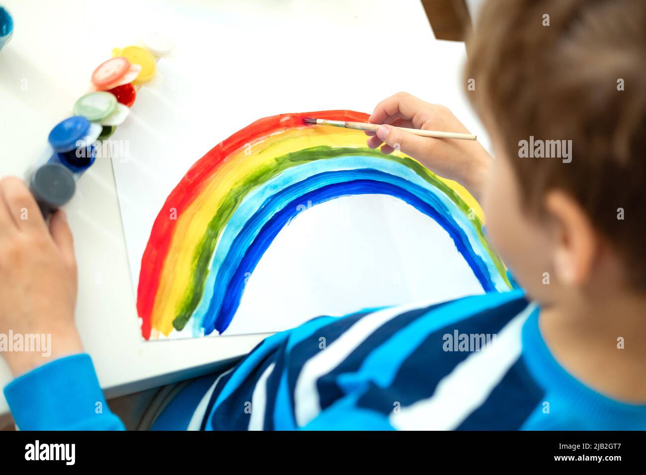 Happy kids doing arts and crafts hi-res stock photography and images ...