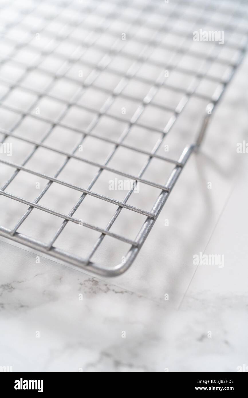 Empty baking drying rack on a marble surface Stock Photo - Alamy