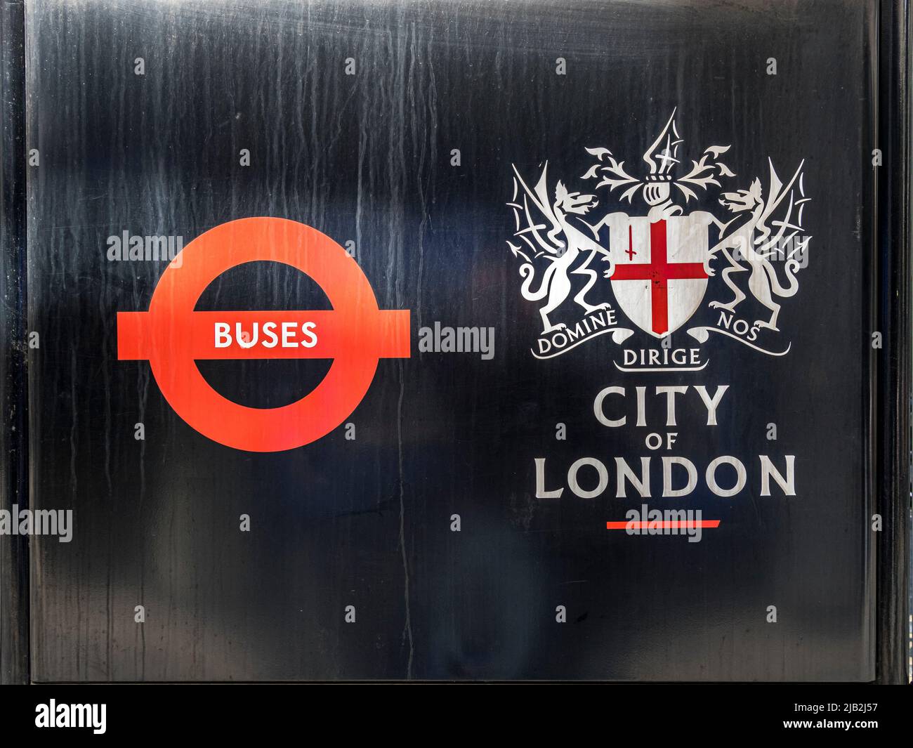 Detail of a City Of London Bus shelter displaying the Coat of arms of ...